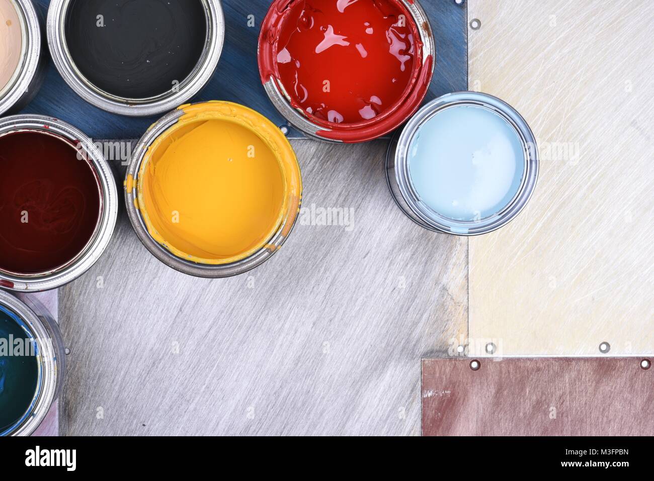 Colorful paint cans top view Stock Photo - Alamy