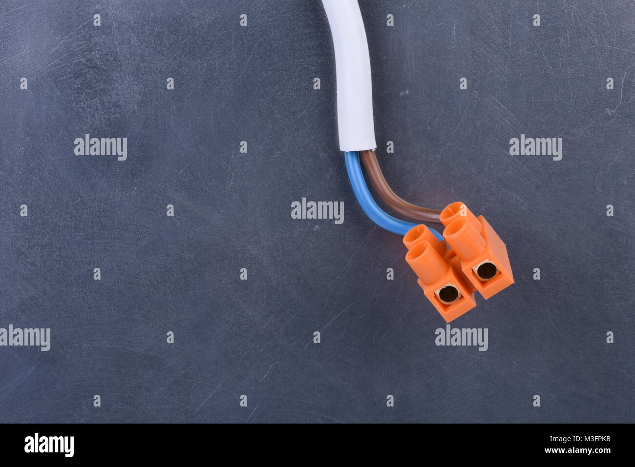 Electrical installation, cable on gray background Stock Photo - Alamy