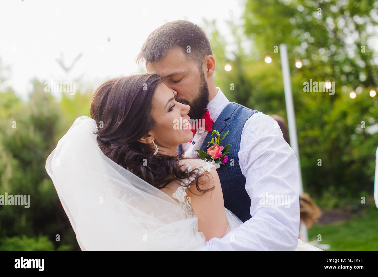 Portrait of wonderful young just married couple in love at nature ...