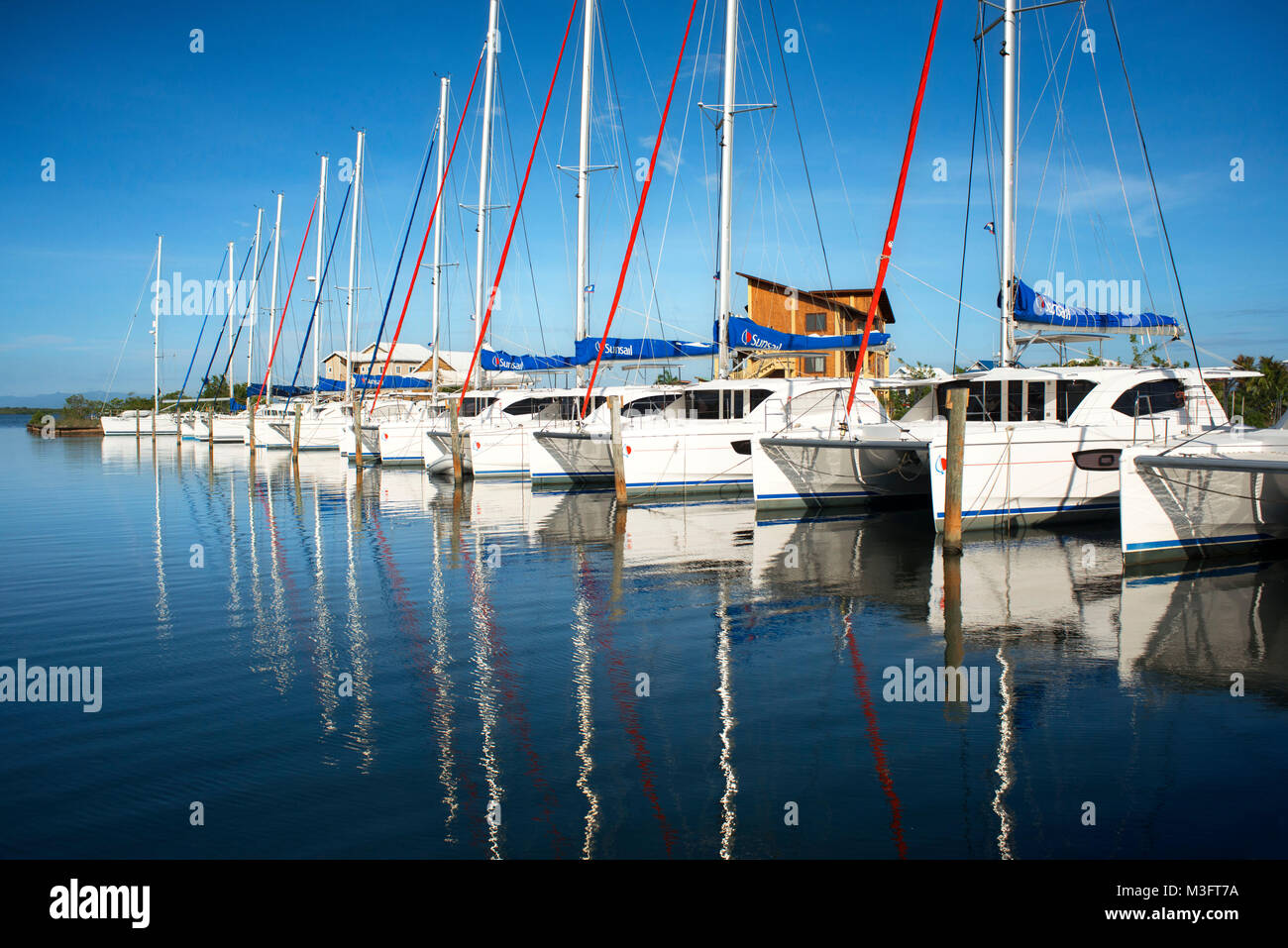 Luxury sail boats in Placencia harbour Belize Stock Photo - Alamy