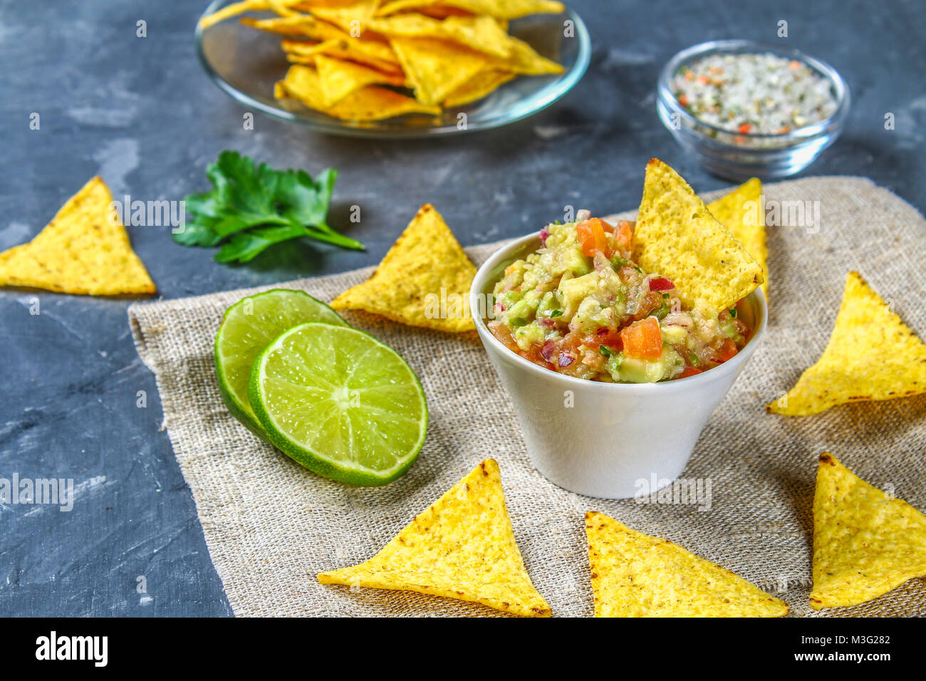 Guacomole is a traditional Mexican sauce consisting of grated avocado ...