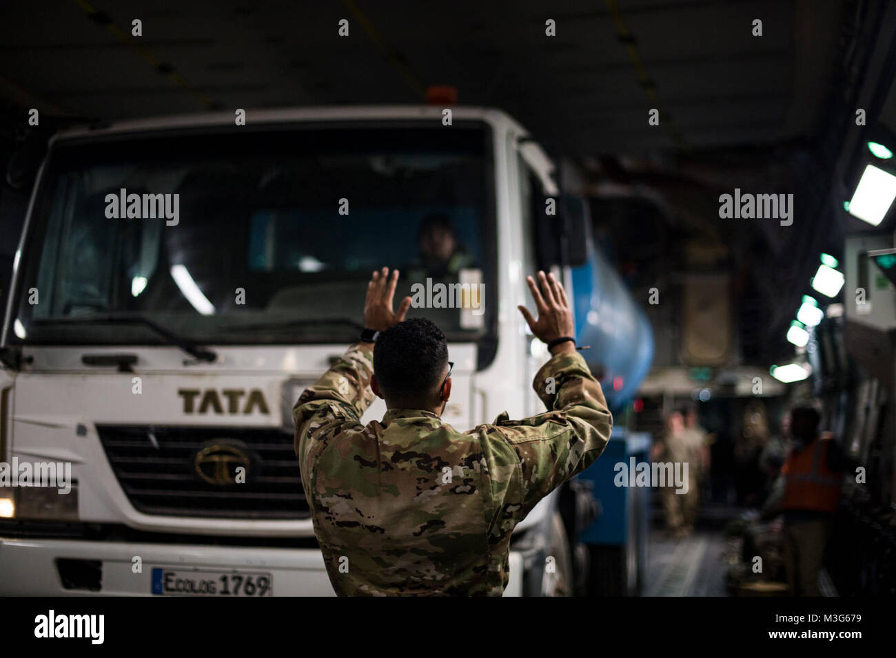 A U.S. Air Force C-17 Globemaster III loadmaster, assigned to the 816th ...
