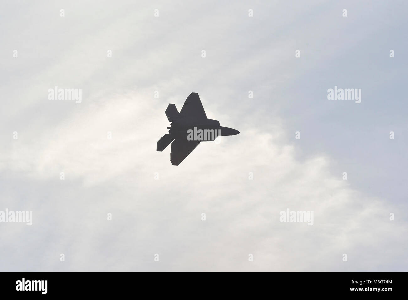 An F-22 Raptor from the Air Combat Command F-22 Demonstration Team at ...