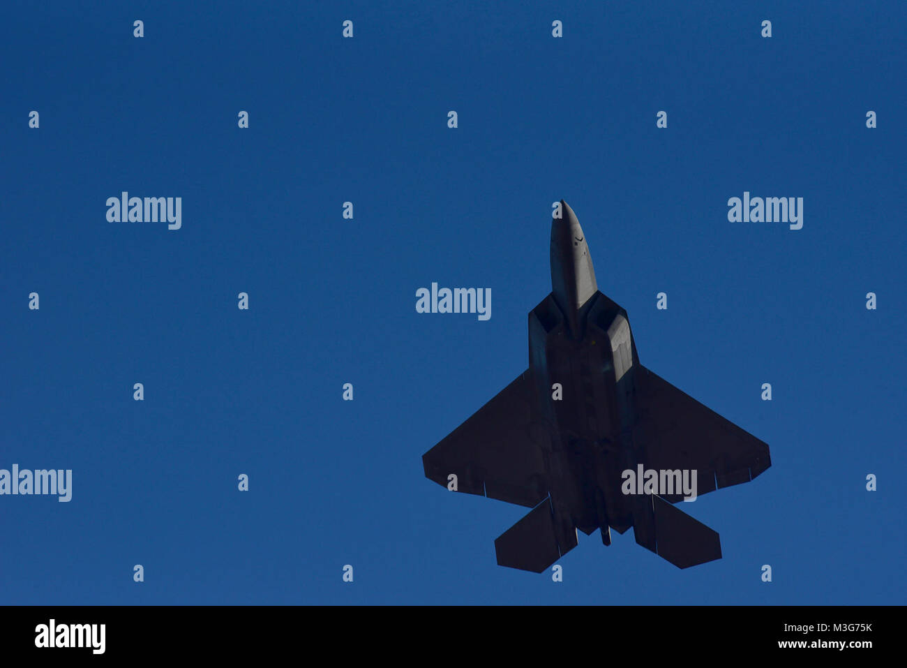 An F-22 Raptor from the Air Combat Command F-22 Demonstration Team at ...