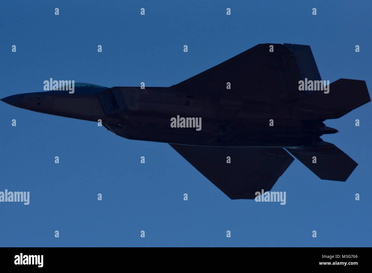 An F-22 Raptor from the Air Combat Command F-22 Demonstration Team at ...