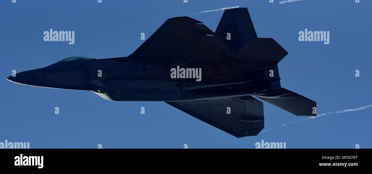 An F-22 Raptor from the Air Combat Command F-22 Demonstration Team at ...