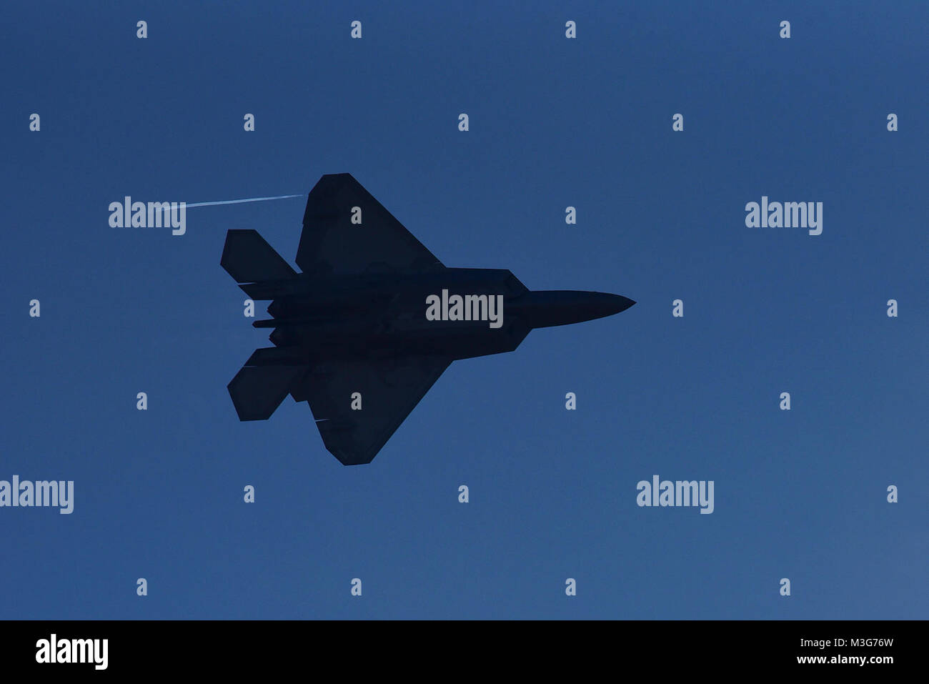 An F-22 Raptor from the Air Combat Command F-22 Demonstration Team at ...