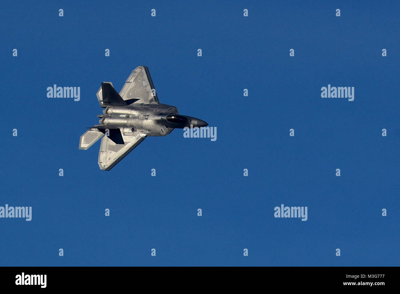 An F-22 Raptor from the Air Combat Command F-22 Demonstration Team at ...