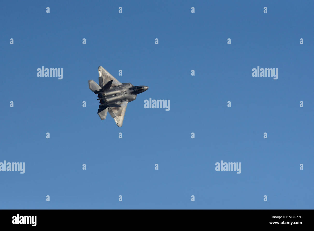 An F-22 Raptor from the Air Combat Command F-22 Demonstration Team at ...