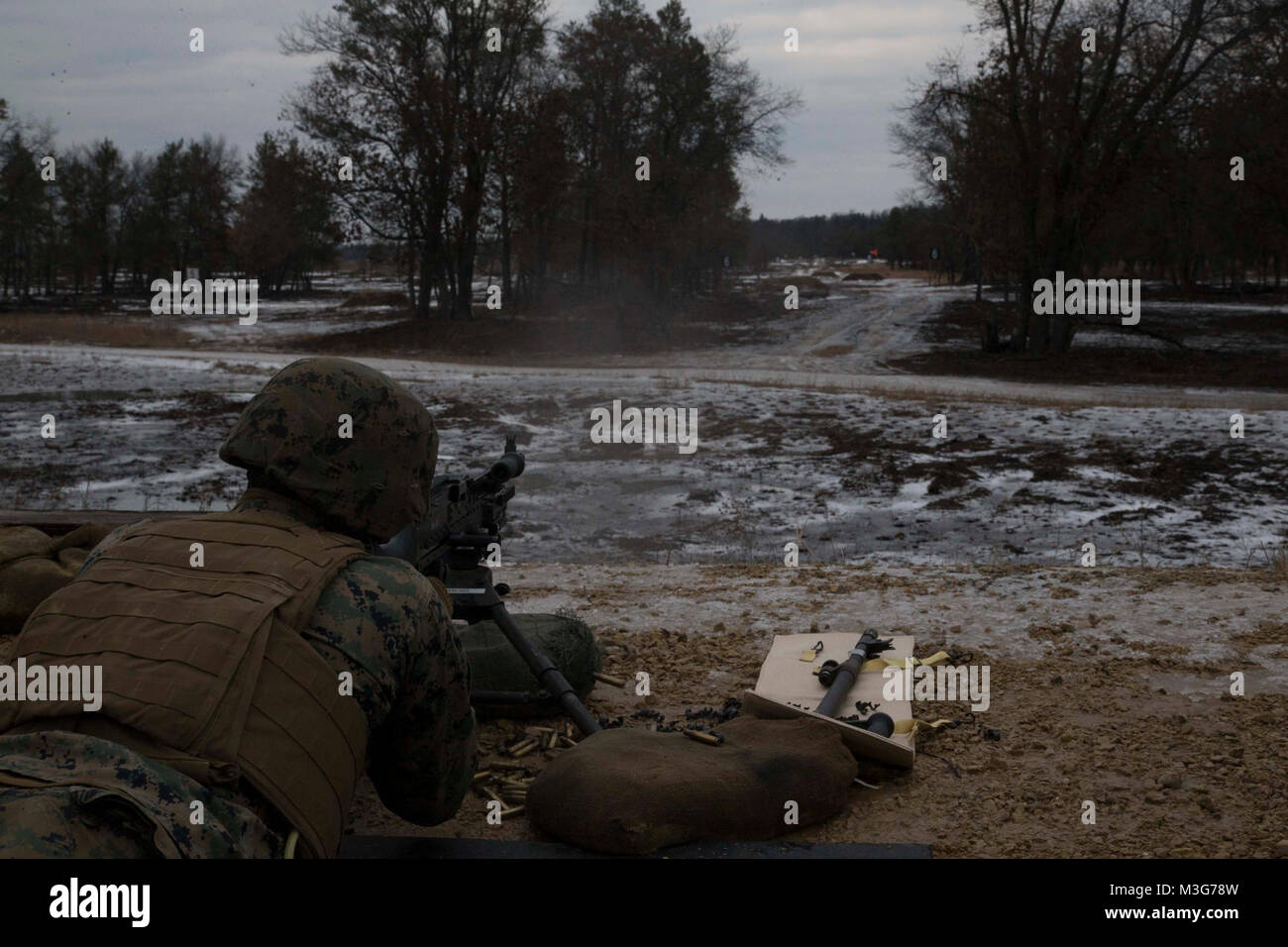 U.S. Marine with Marine Unmanned Aerial Vehicle Squadron (VMU) 2 fires ...