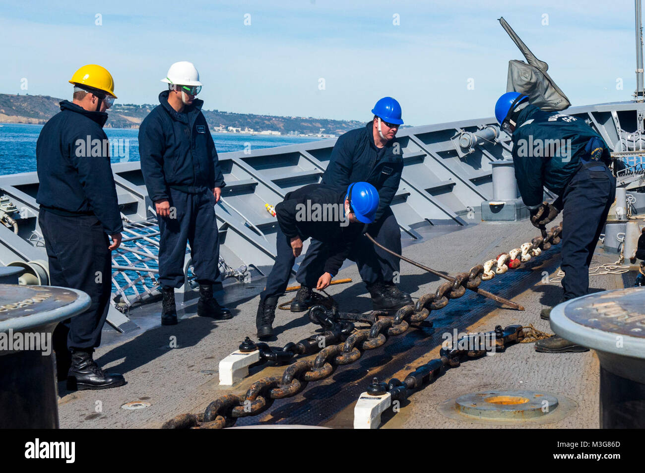 OCEAN (Jan 27, 2018) Sailors secure the anchor chain aboard the ...