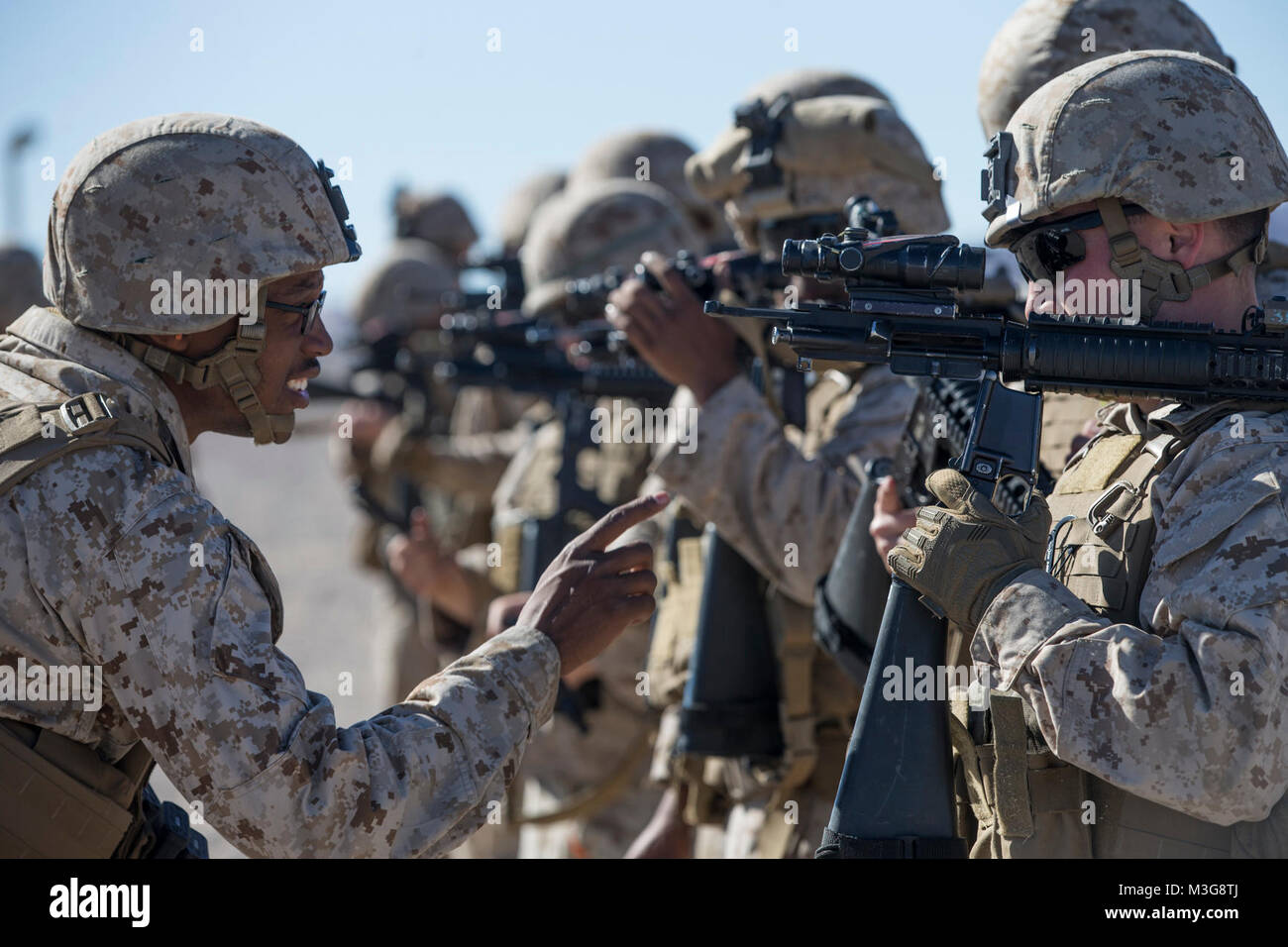 U.S. Marine Corps Sgt. Michael J. Williams, left, a low altitude air ...
