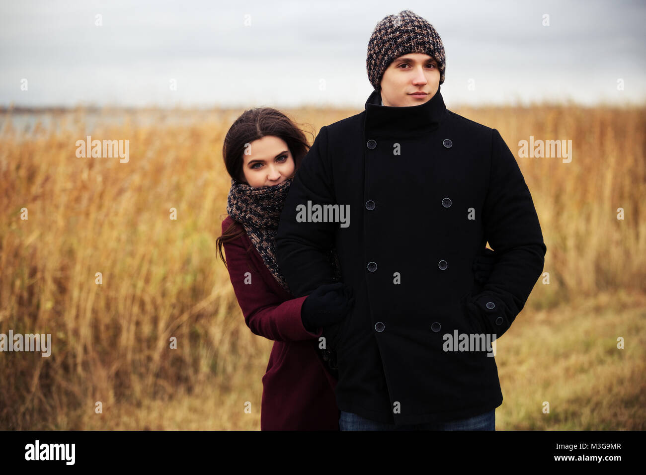 Happy young couple in love walking outdoor Stock Photo - Alamy