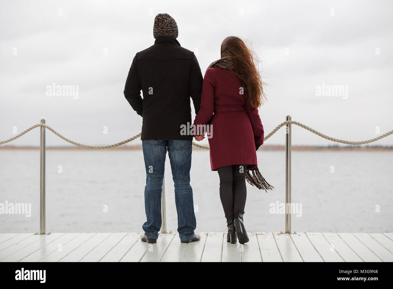 Happy young couple in love walking outdoor Stock Photo - Alamy
