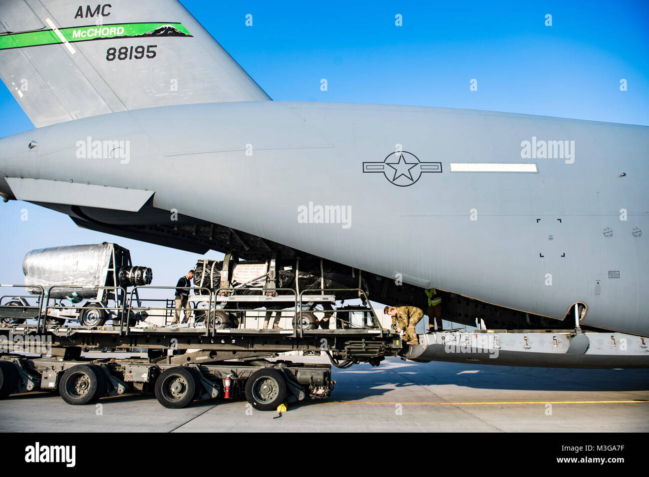 U.S. Air Force C-17 Globemaster III loadmasters, assigned to the 816th ...