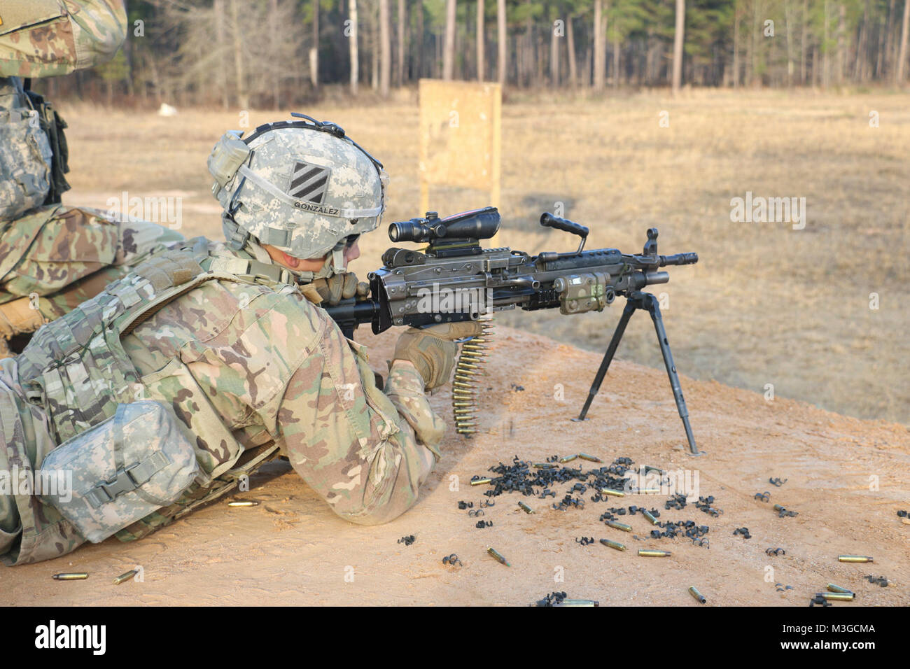 Pfc. Lionel Gonzales, an automatic rifleman assigned to 3rd Platoon, B ...