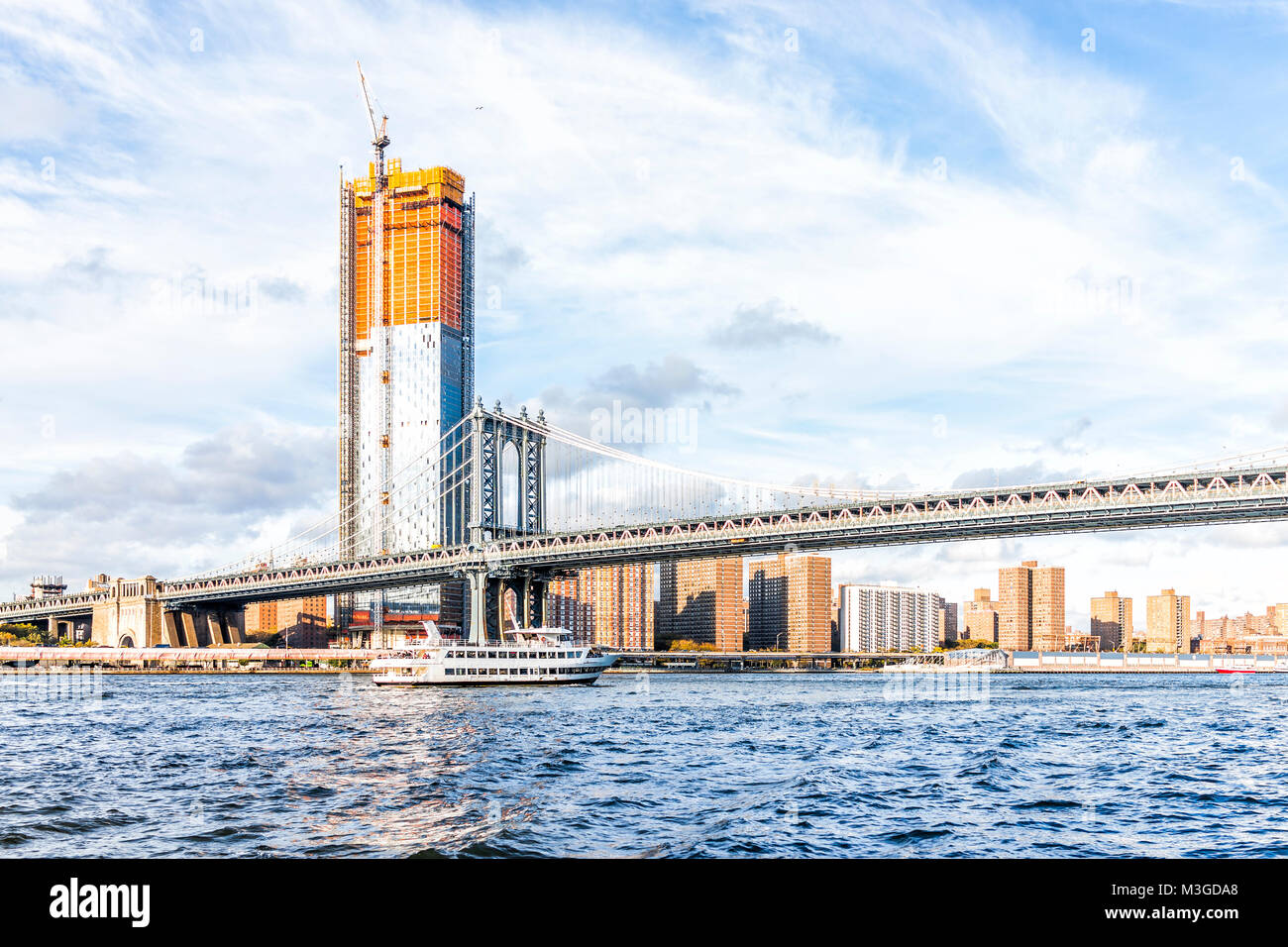 East river water with view of NYC New York City cityscape skyline ...