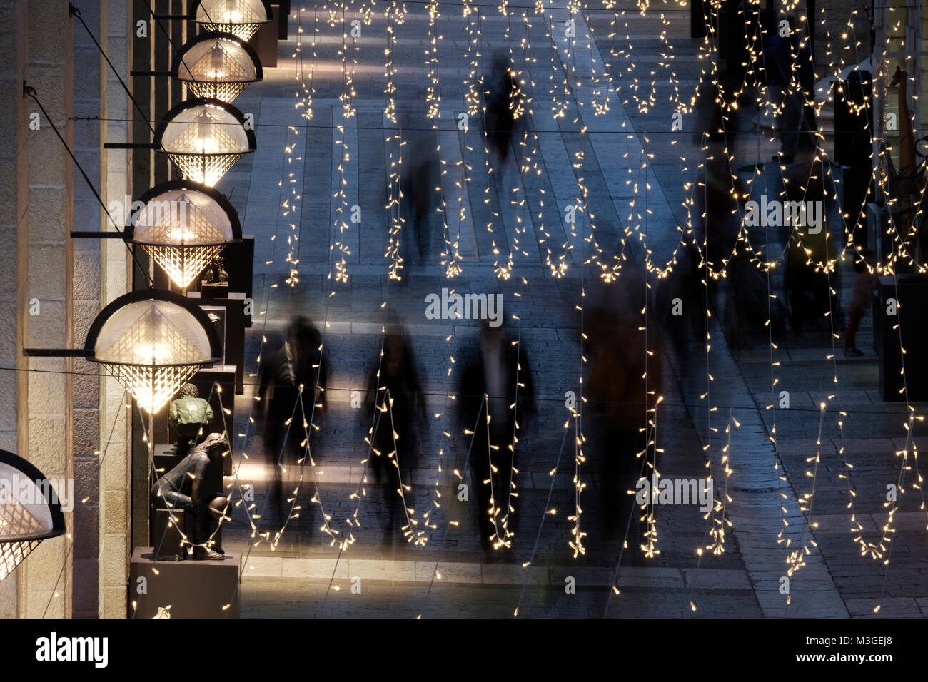 Pedestrians walk at night along Mamilla Mall, also known as Alrov ...