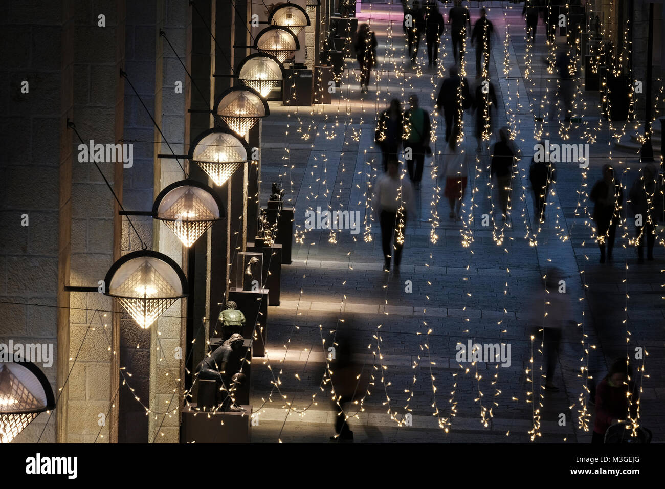 Pedestrians walk at night along Mamilla Mall, also known as Alrov ...