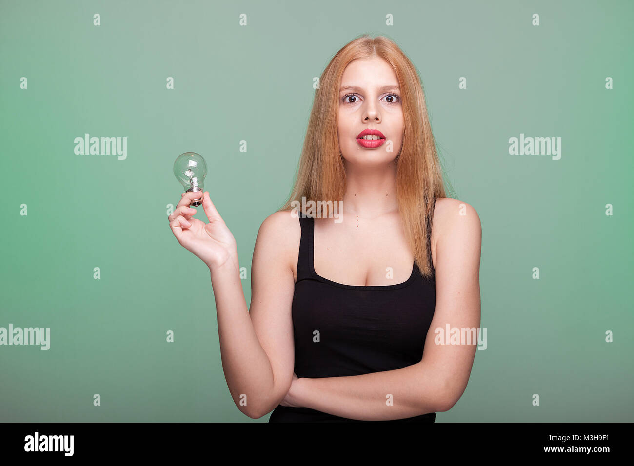 Woman led light bulb hi-res stock photography and images - Alamy