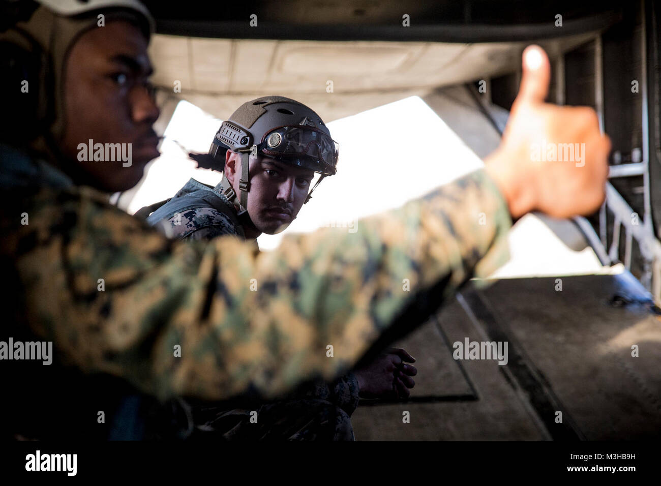 A U.S. Marine prepares to jump during low level static line (LLSL ...