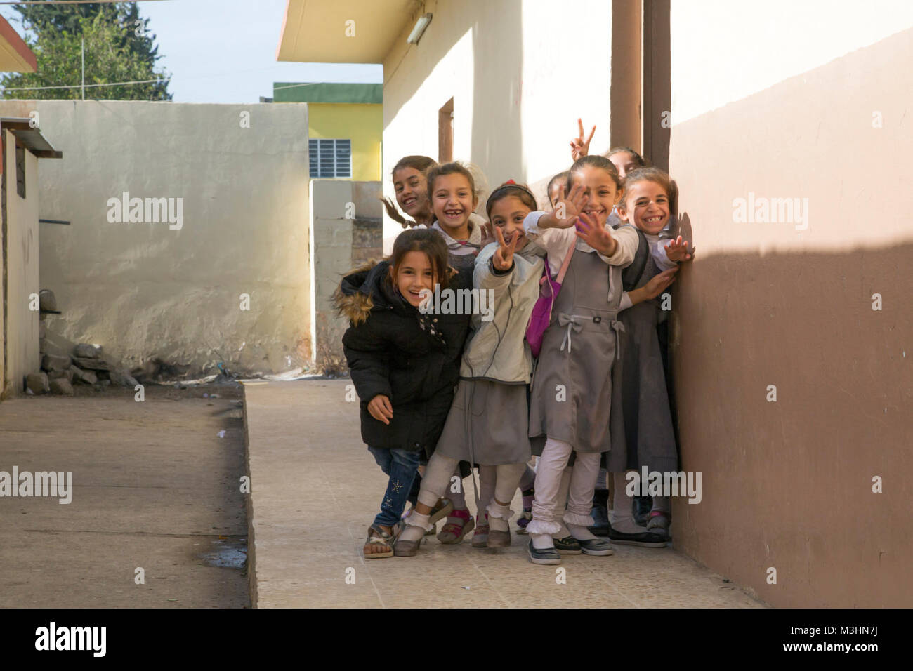 Iraqi students pose for a Stock Photo - Alamy