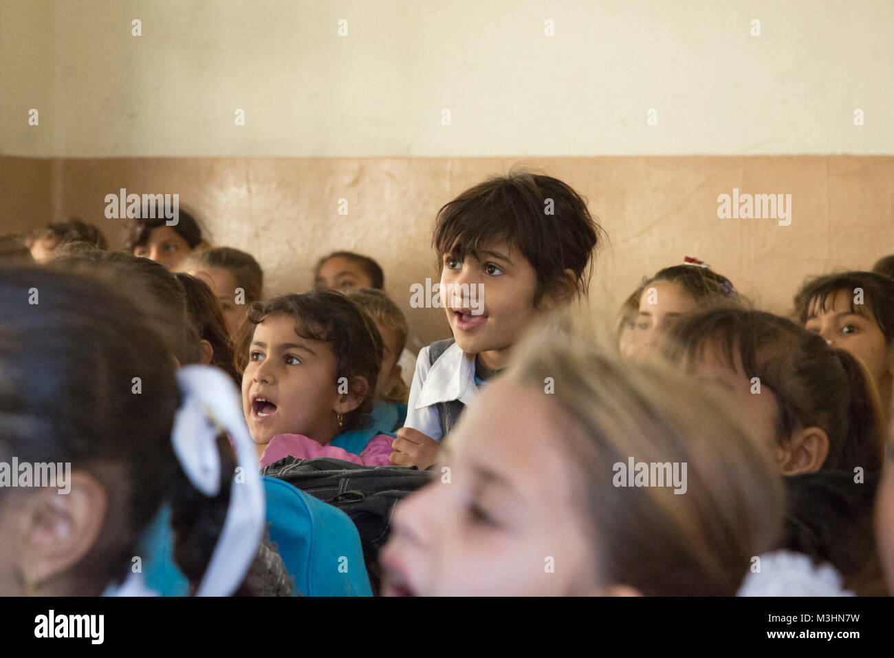 Young Iraqi students recite the alphabet at a primary school, Aski ...