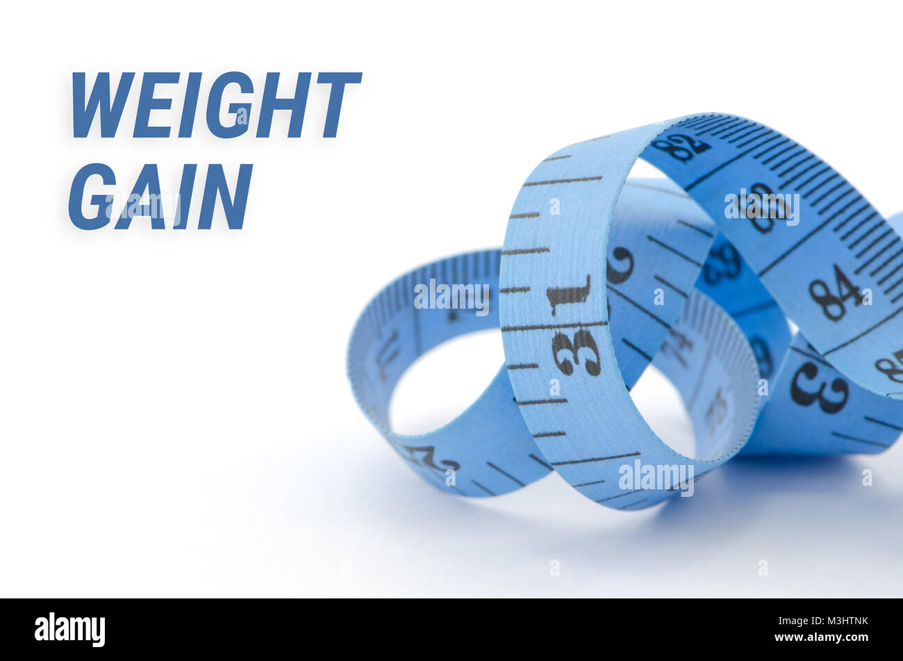 Weight gain, health concept, close up & selective focus of blue ...