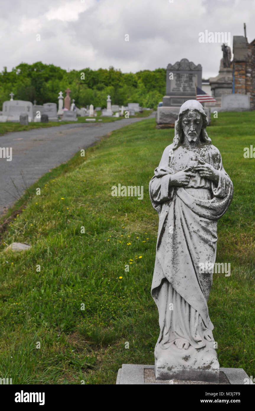 Statue of Jesus in a Catholic Cemetery Stock Photo - Alamy
