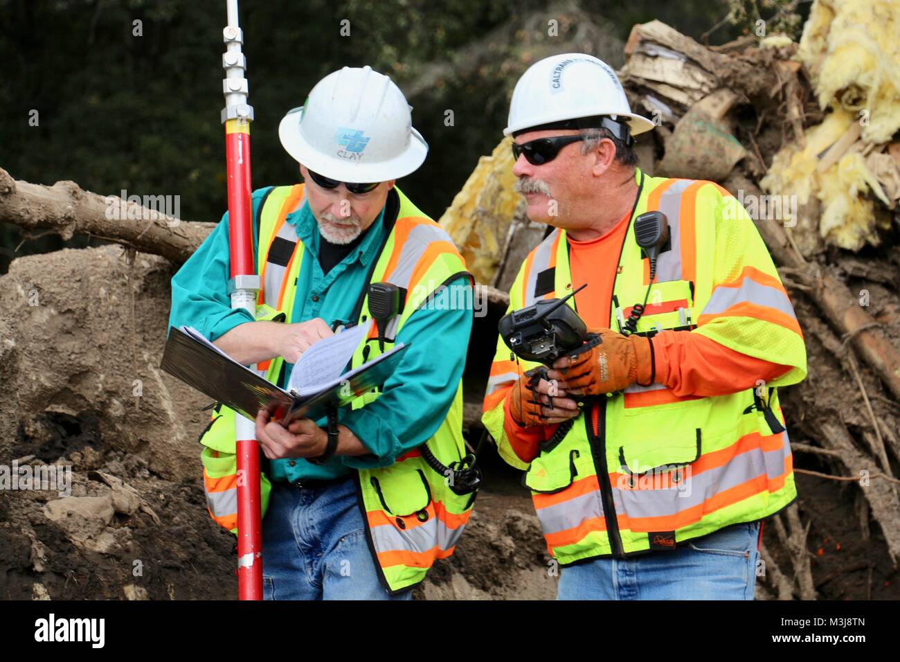 Montecito, California, USA. 19th Jan, 2018. Caltrans Surveyors begin to ...