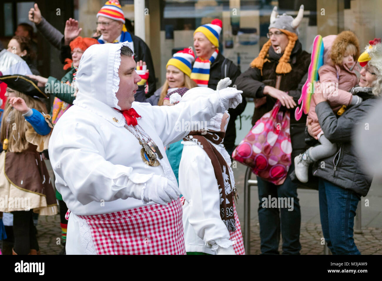 Participants of the Jugendmaskenzug carnival parade in Mainz, Germany ...