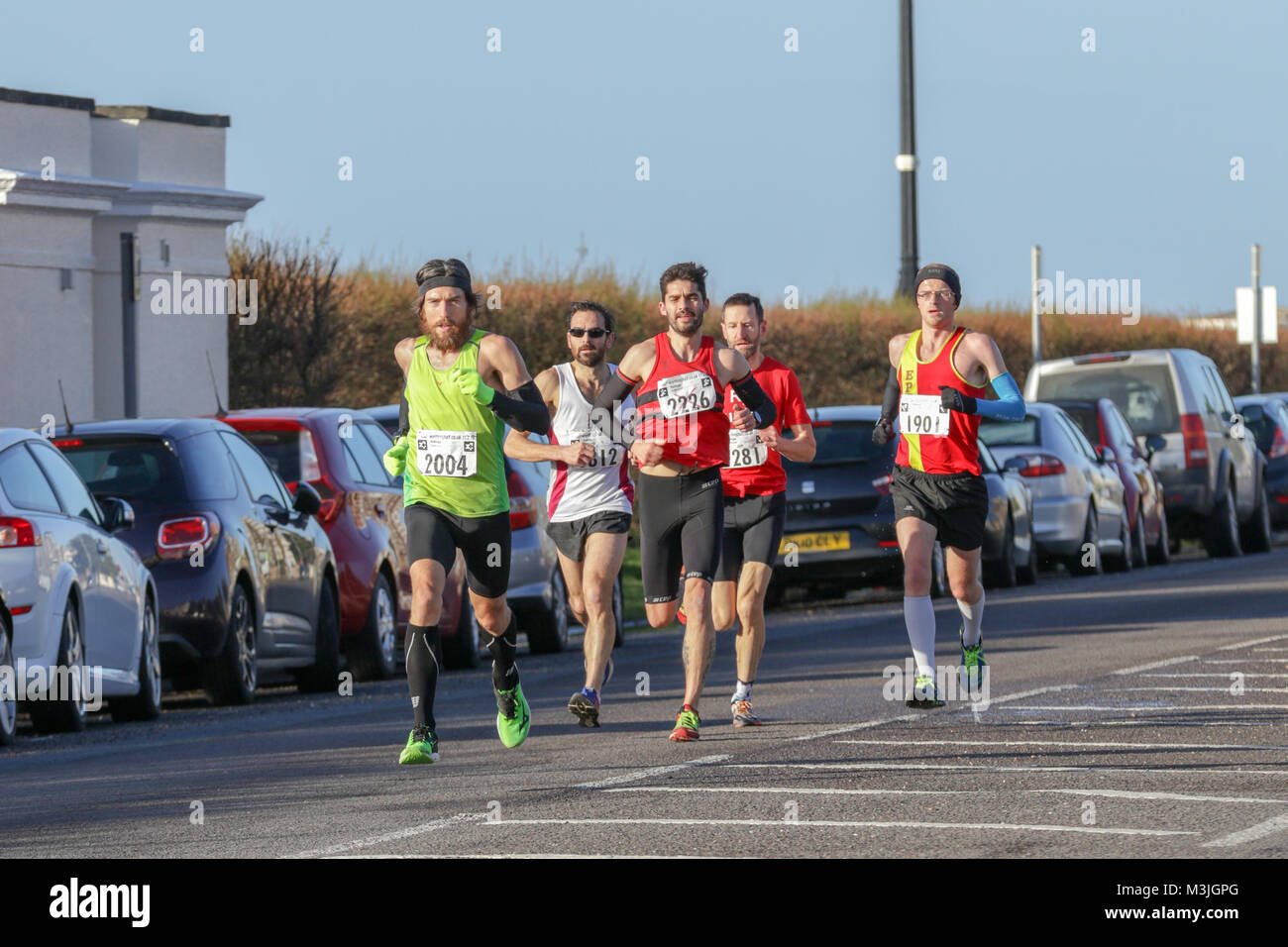 Who is leading the race hi-res stock photography and images - Alamy