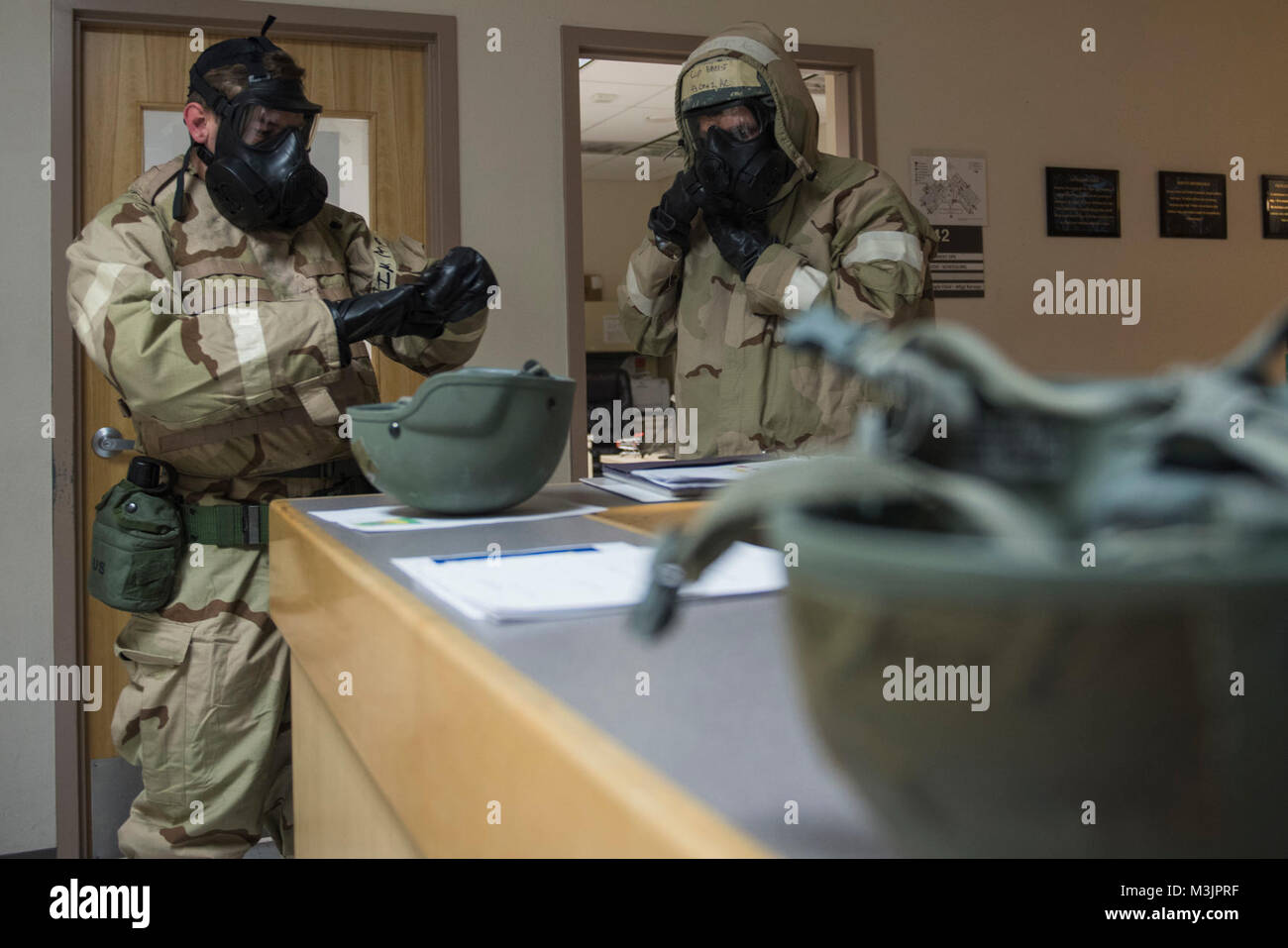 U.S. Airmen gear up for a post-attack reconnaissance sweep exercise at ...