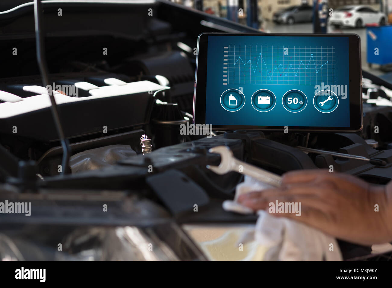 Mechanic repairing Car service concept. repair car engine Stock Photo ...