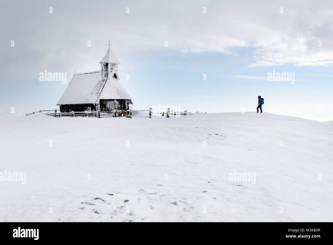 Woman and child in the idyllic winter wonderland in the Alps with ...