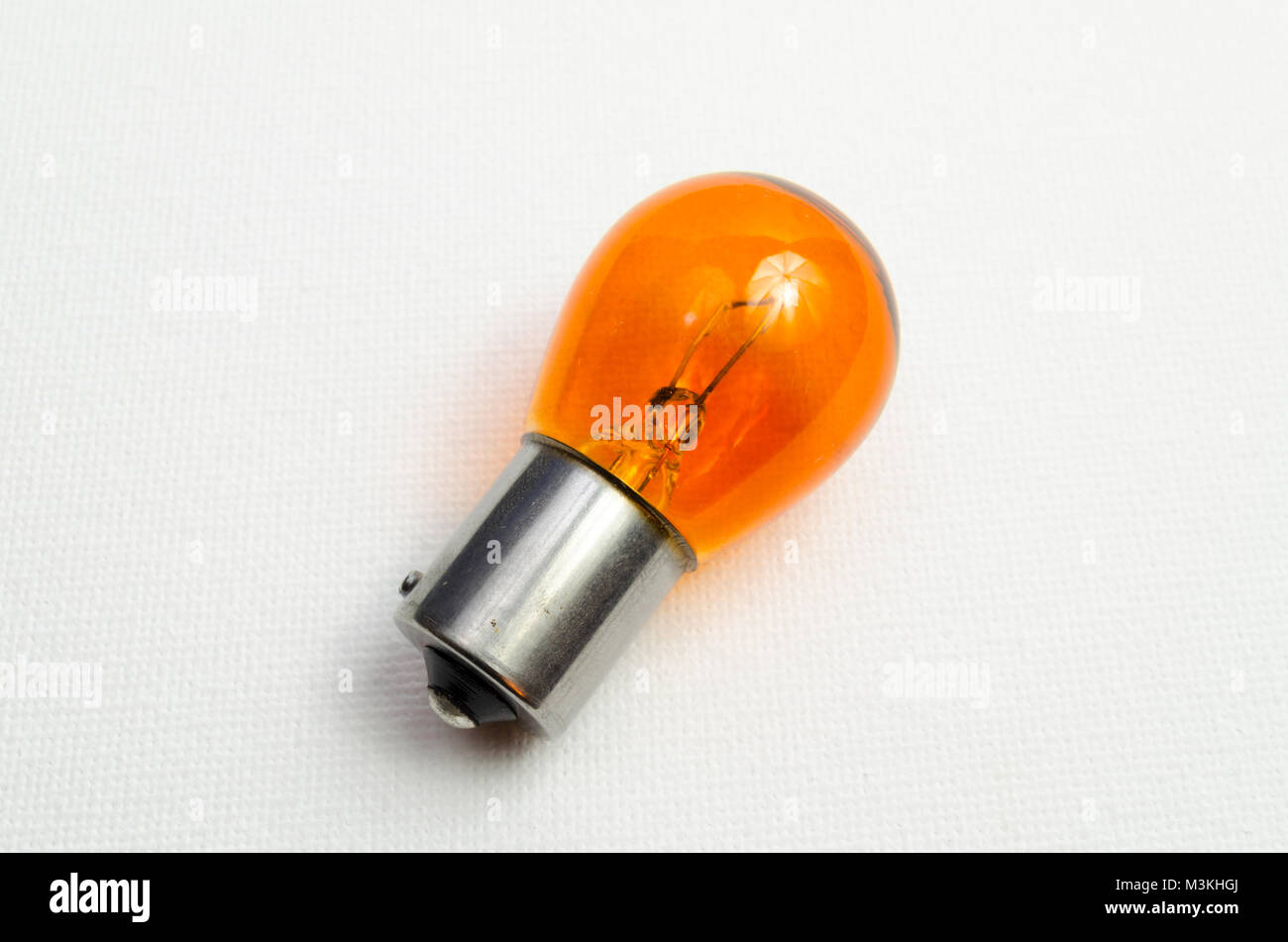 A Studio Photograph of an Orange Coloured Automotive Indicator Bulb ...