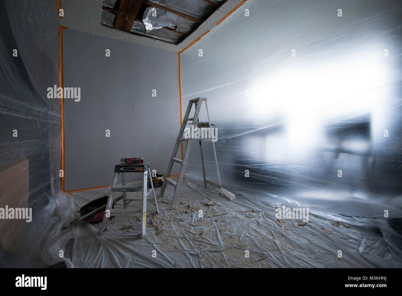 Interior room construction ceiling repair Stock Photo - Alamy