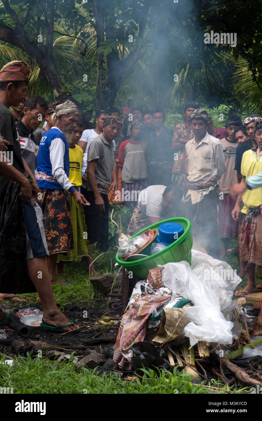Balinese people bury their dead in a traditional cremation ceremony ...