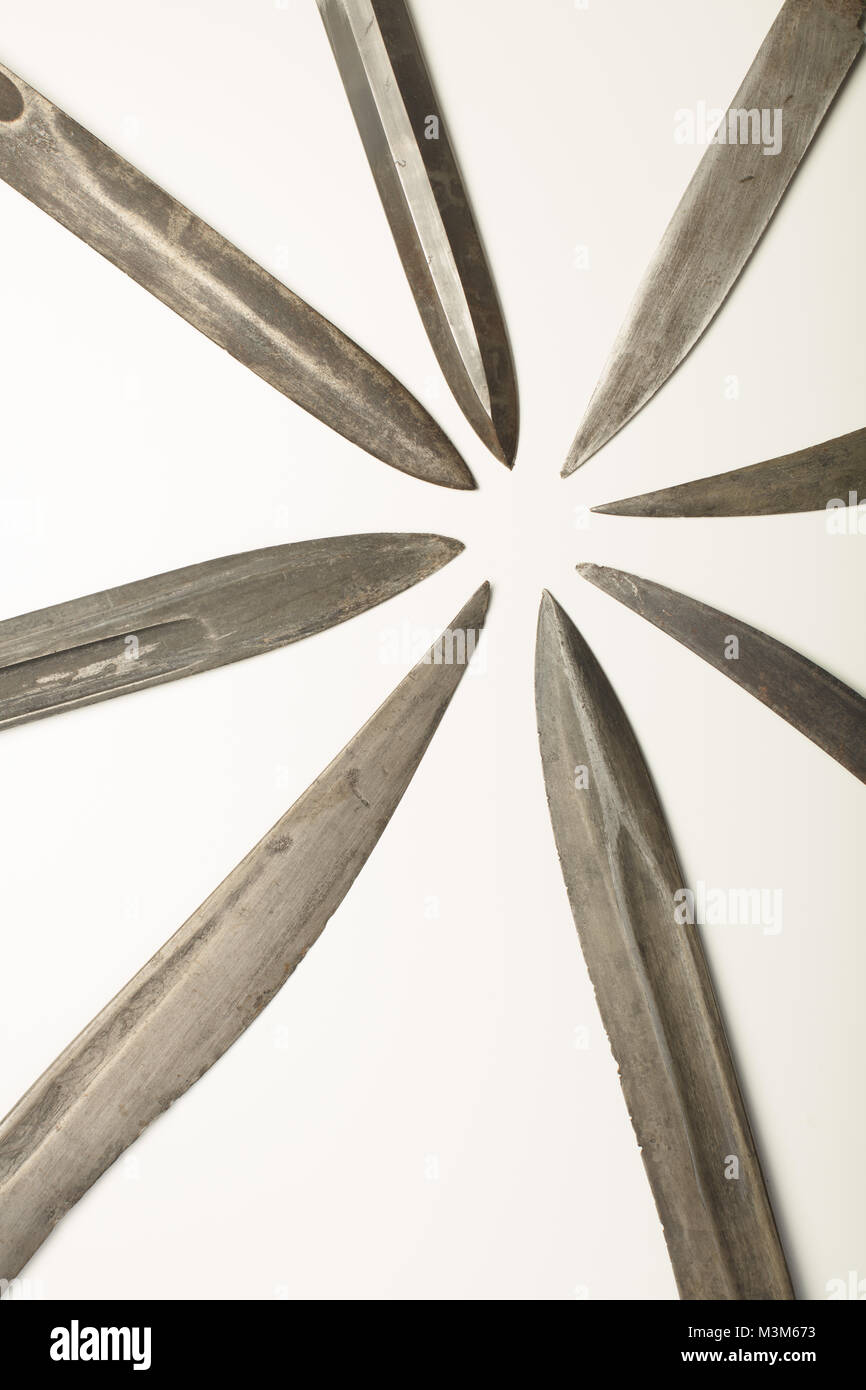 Collection of knife or dagger blades and swords arranged in a still ...