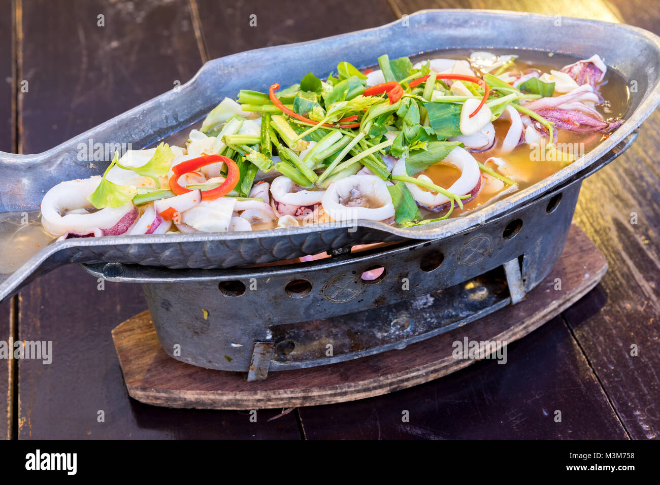 steamed octopus with lime spicy sauce Stock Photo - Alamy