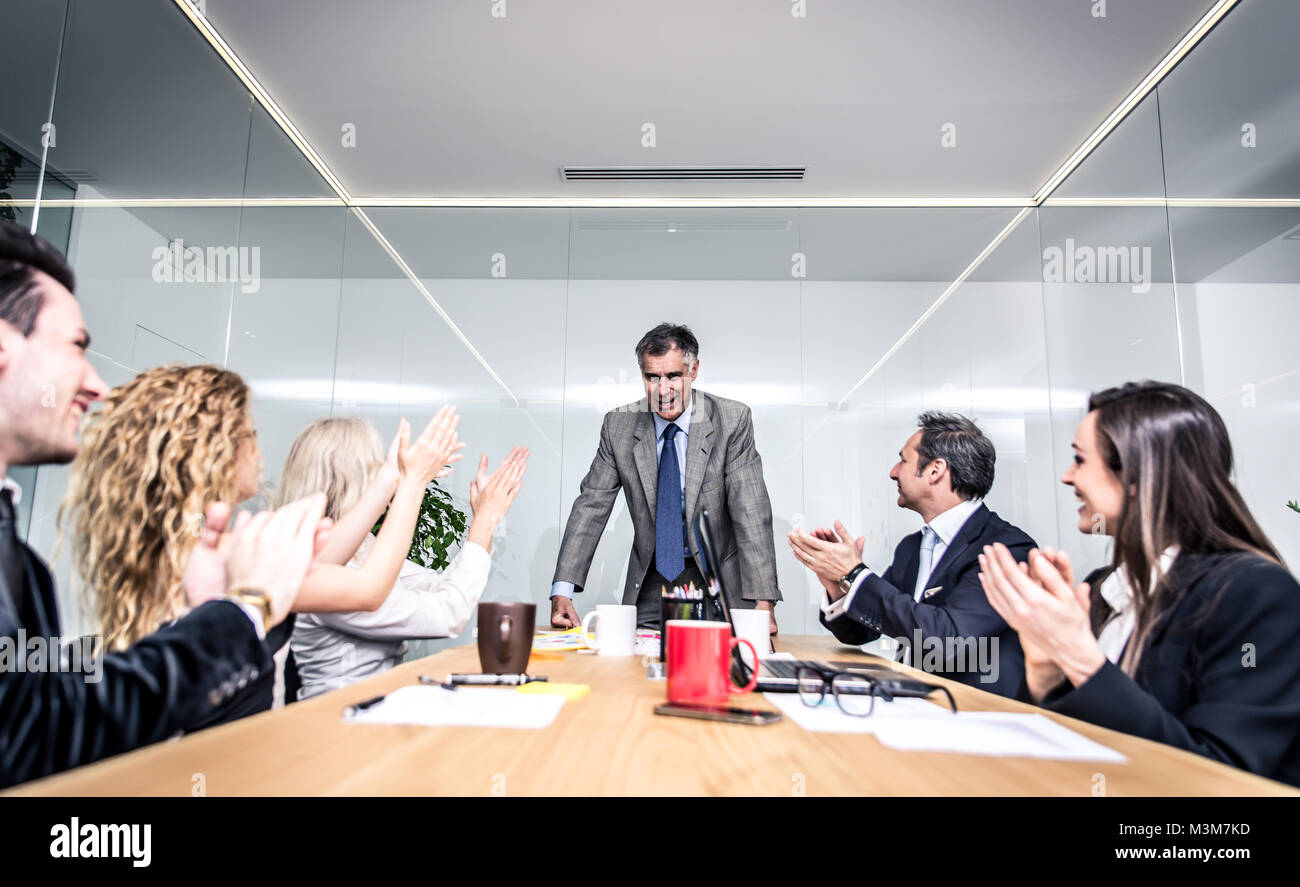 Office people working and talking about business plans Stock Photo - Alamy