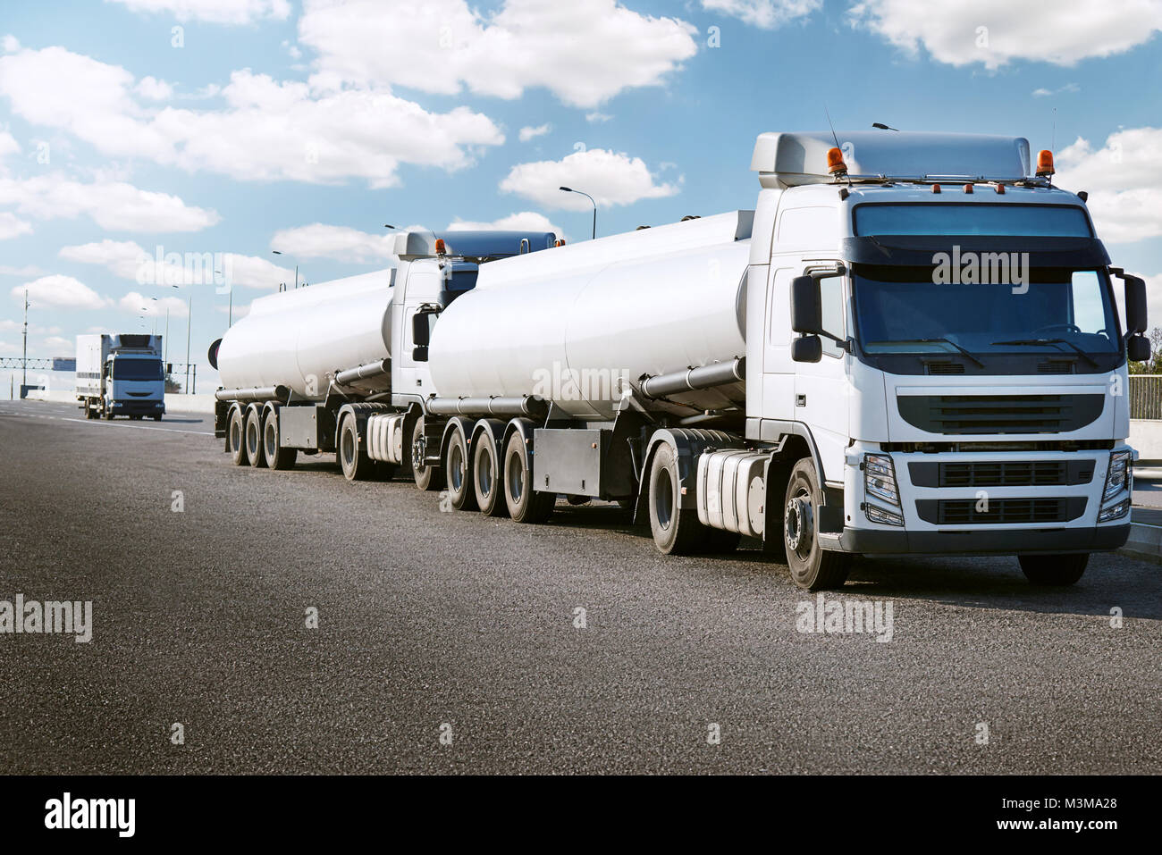 tank truck on road, cargo transportation and shipping concept Stock ...