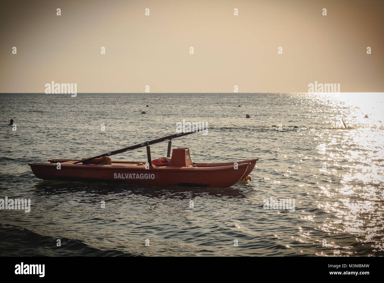 Gallipoli (Italy), August 2017. A lifeguard rowing catamaran on a beach ...