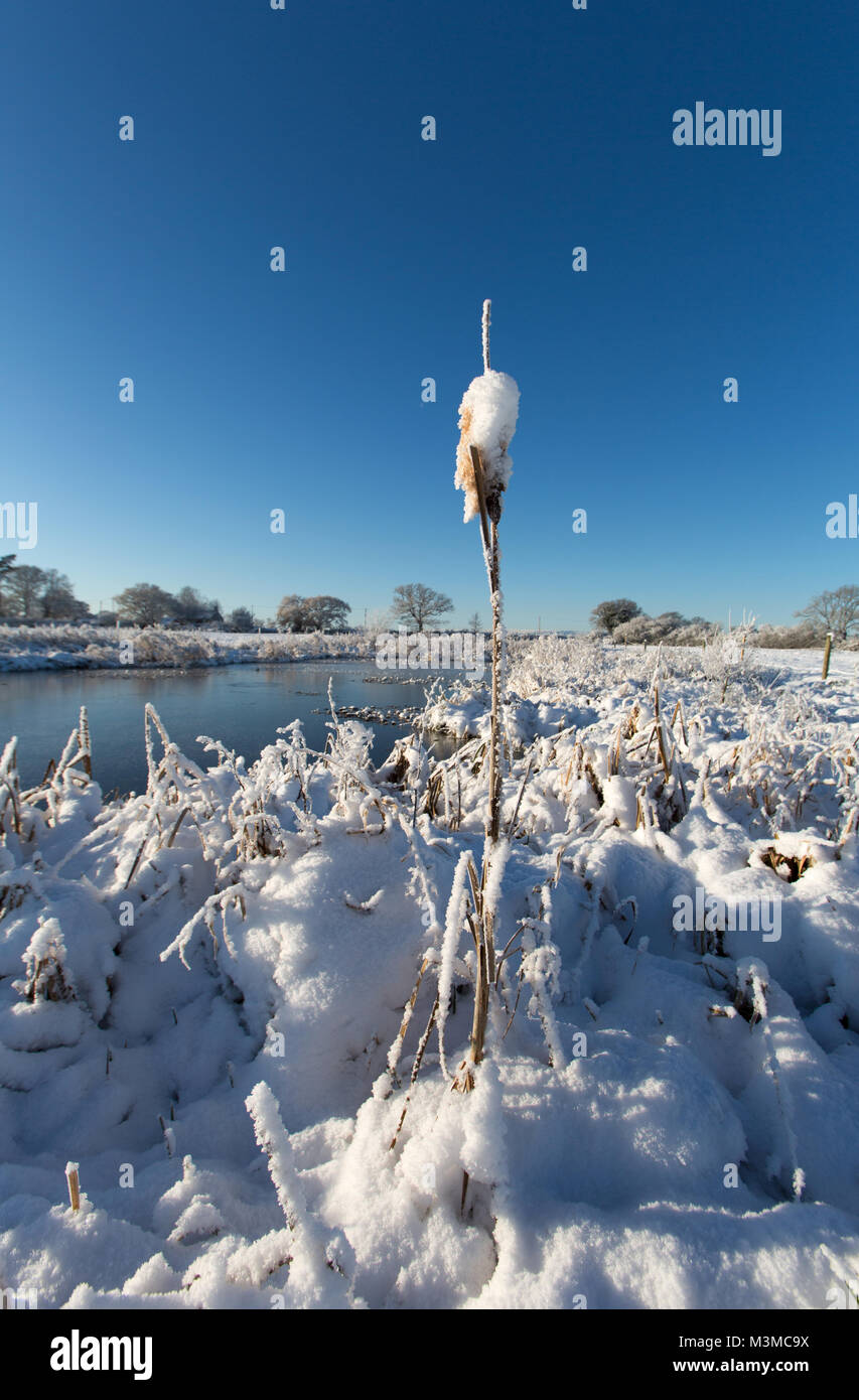 Village of Coddington, England. Picturesque snowy winter view over a ...