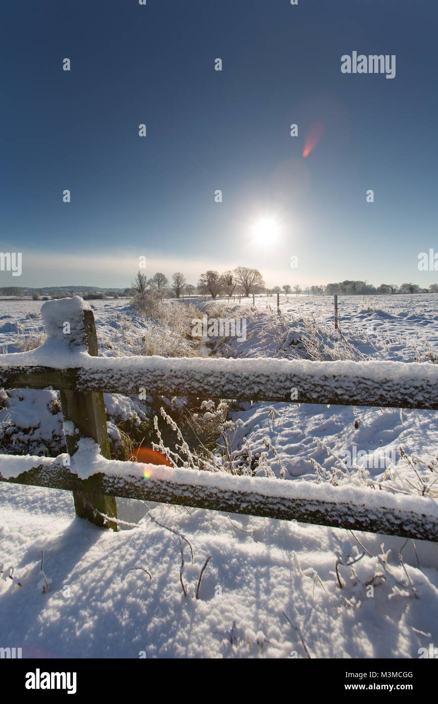 Village of Coddington, England. Picturesque snowy winter view over a ...