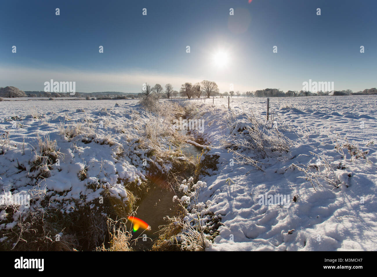 Village of Coddington, England. Picturesque snowy winter view over a ...