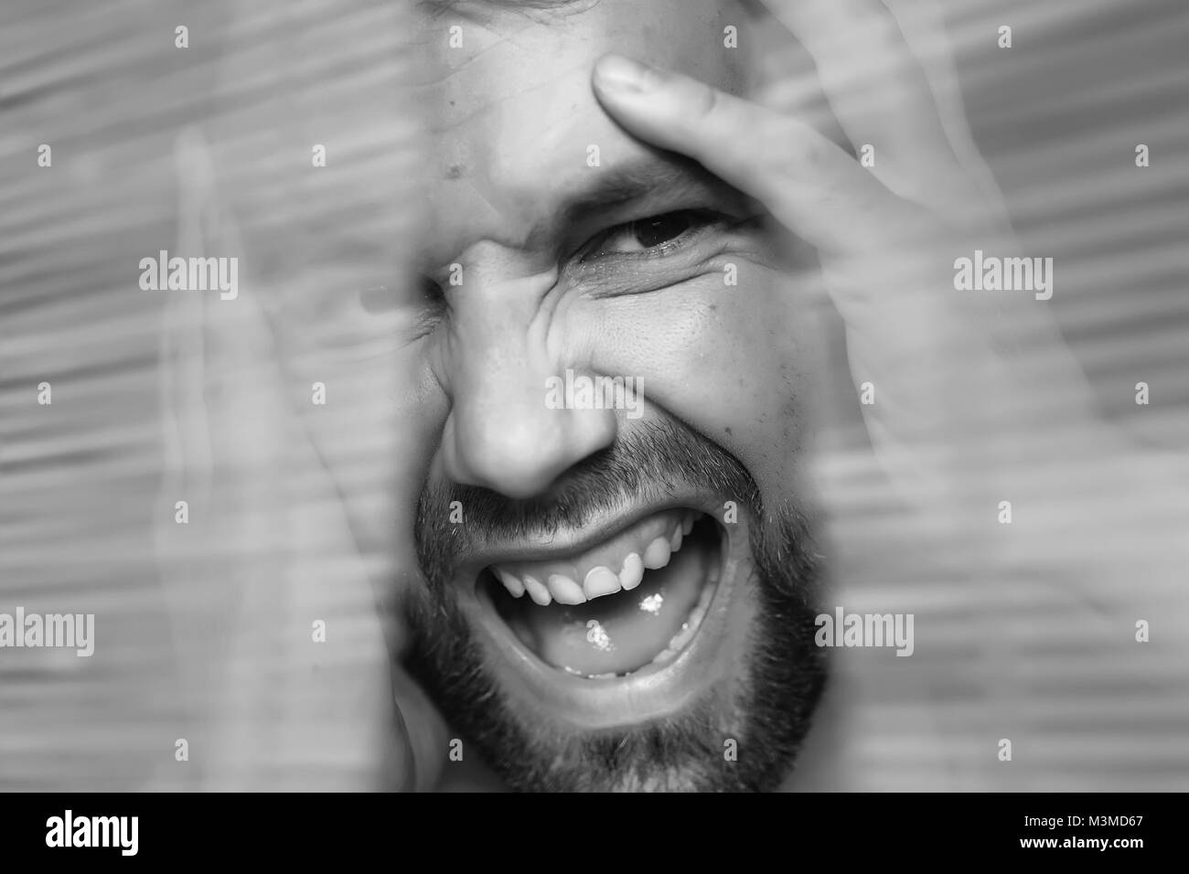 Man eyes through Black and White Stock Photos & Images - Alamy