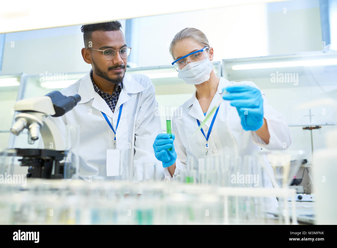 Scientists Doing Research in Medical Laboratory Stock Photo - Alamy