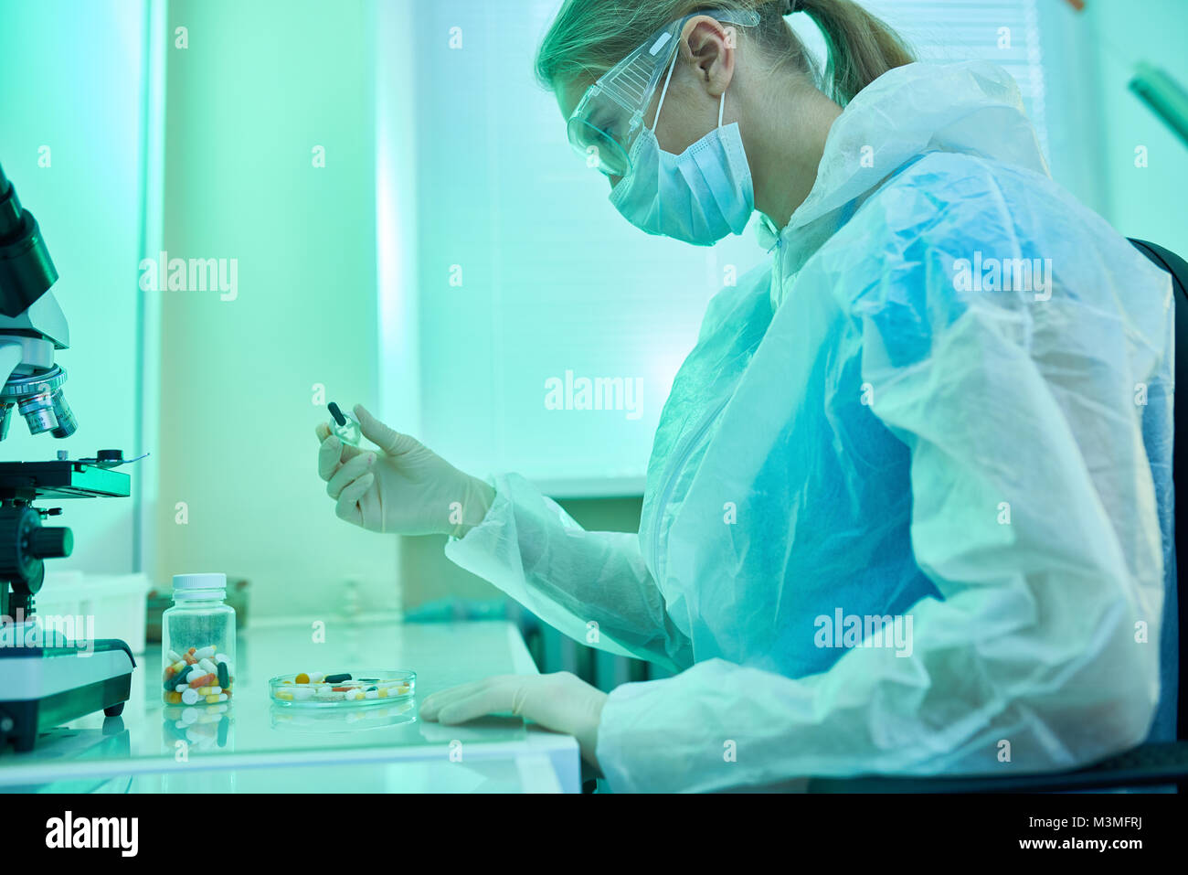 Female Scientist Researching Virus Stock Photo - Alamy