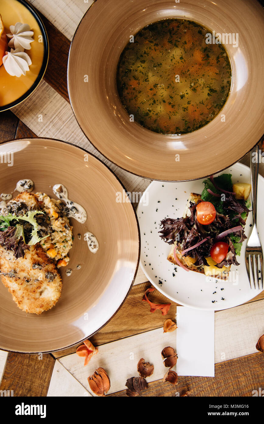 Chef's specialty presented in restaurant on served table Stock Photo ...